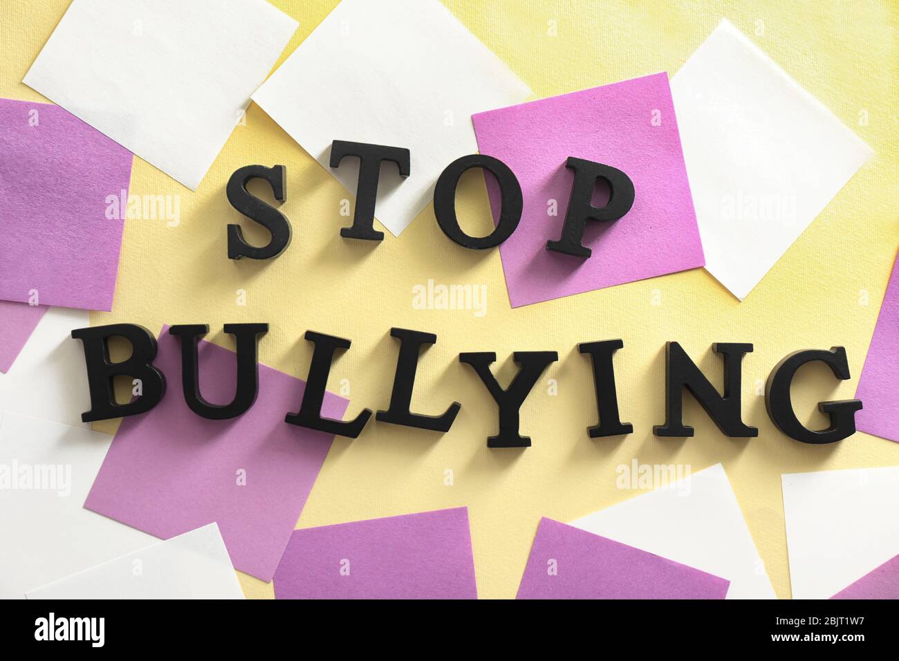 Text "Stop bullying" on table, top view Stock Photo - Alamy
