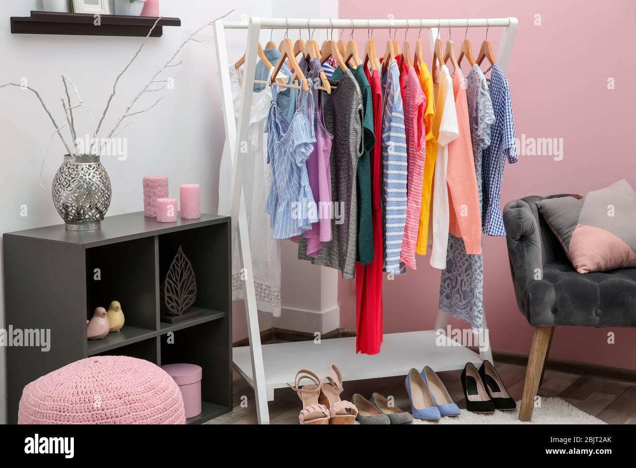 Neat dressing room interior with clothes rack Stock Photo - Alamy