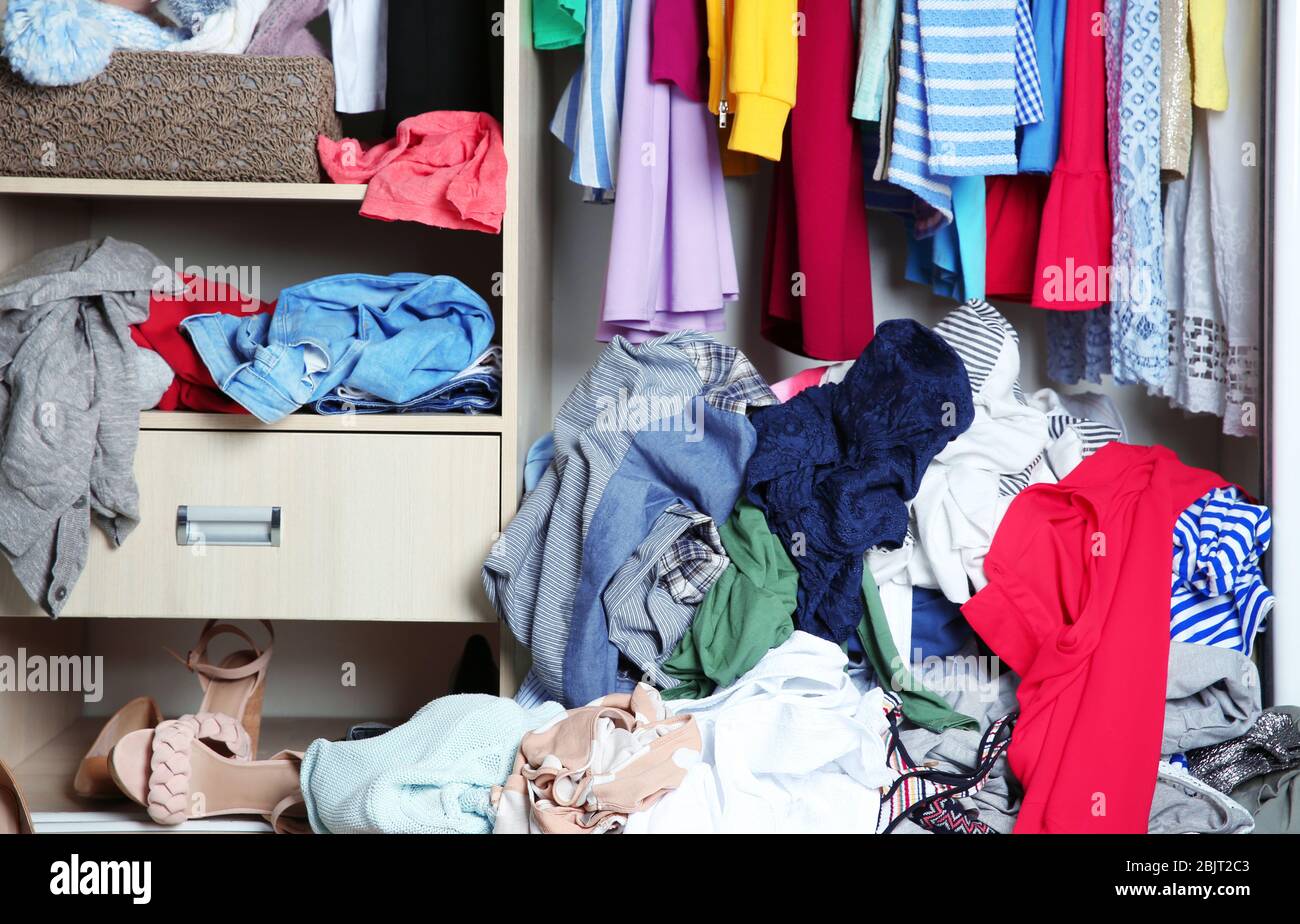 Wardrobe with messy clothes, closeup Stock Photo - Alamy