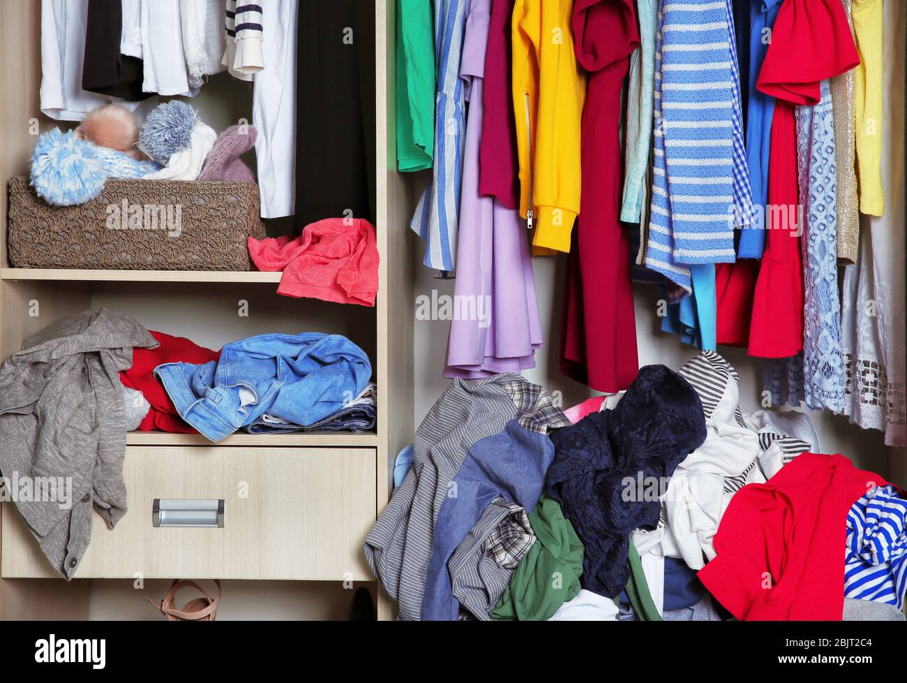 Wardrobe with messy clothes, closeup Stock Photo - Alamy
