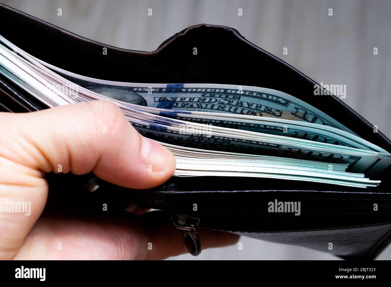 Side view pile of cash black hi-res stock photography and images - Alamy