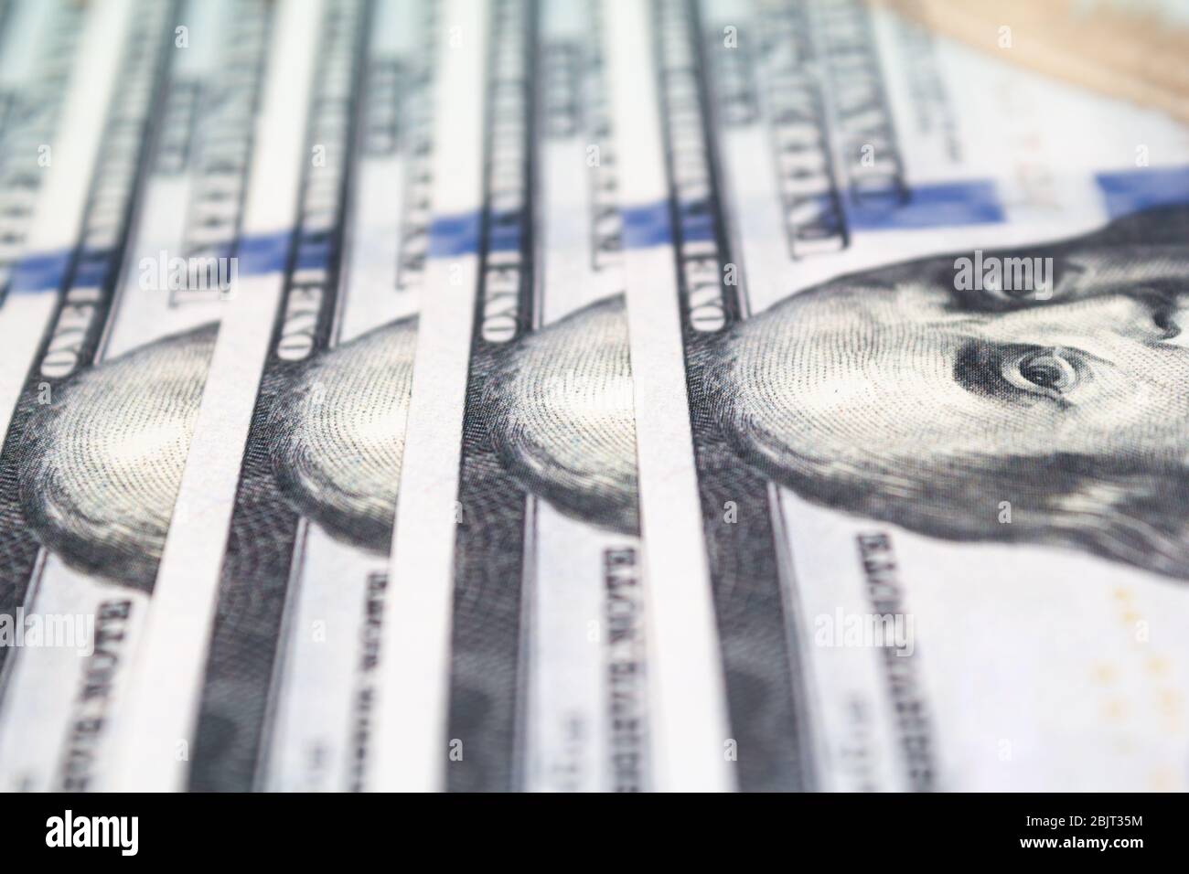 pattern of dollar bills. close up side view Stock Photo - Alamy