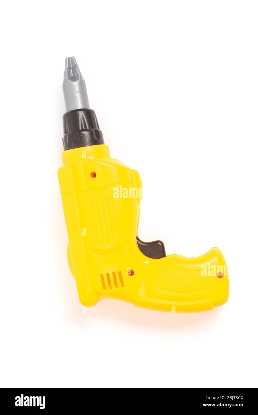 yellow toy screwdriver on a white background isolate, top view Stock ...