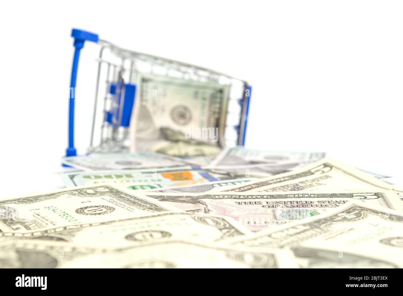 fallen basket with blue inserts drop hundred dollar bills on a white ...