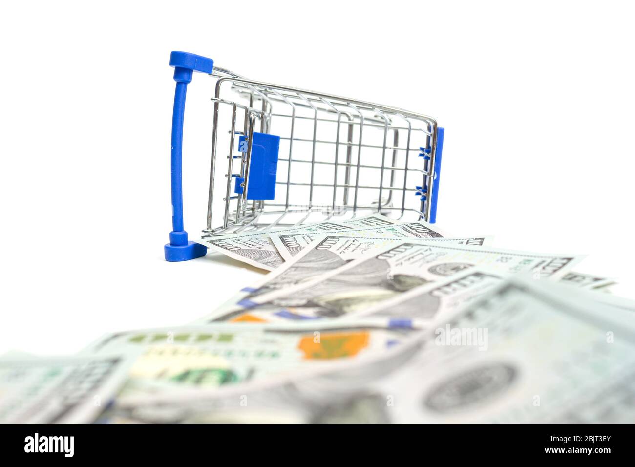 fallen basket with blue inserts drop hundred dollar bills on a white ...