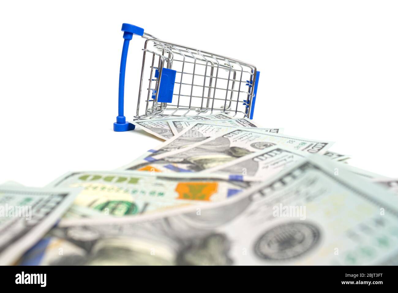 fallen basket with blue inserts drop hundred dollar bills on a white ...