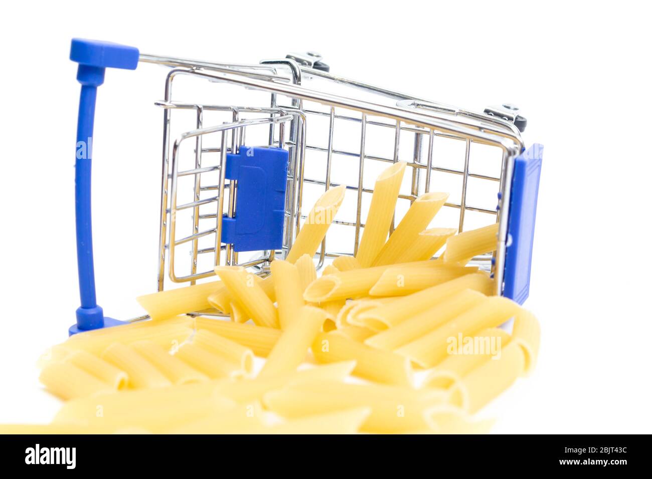 fallen shopping cart with pasta on a white background. isolate Stock ...