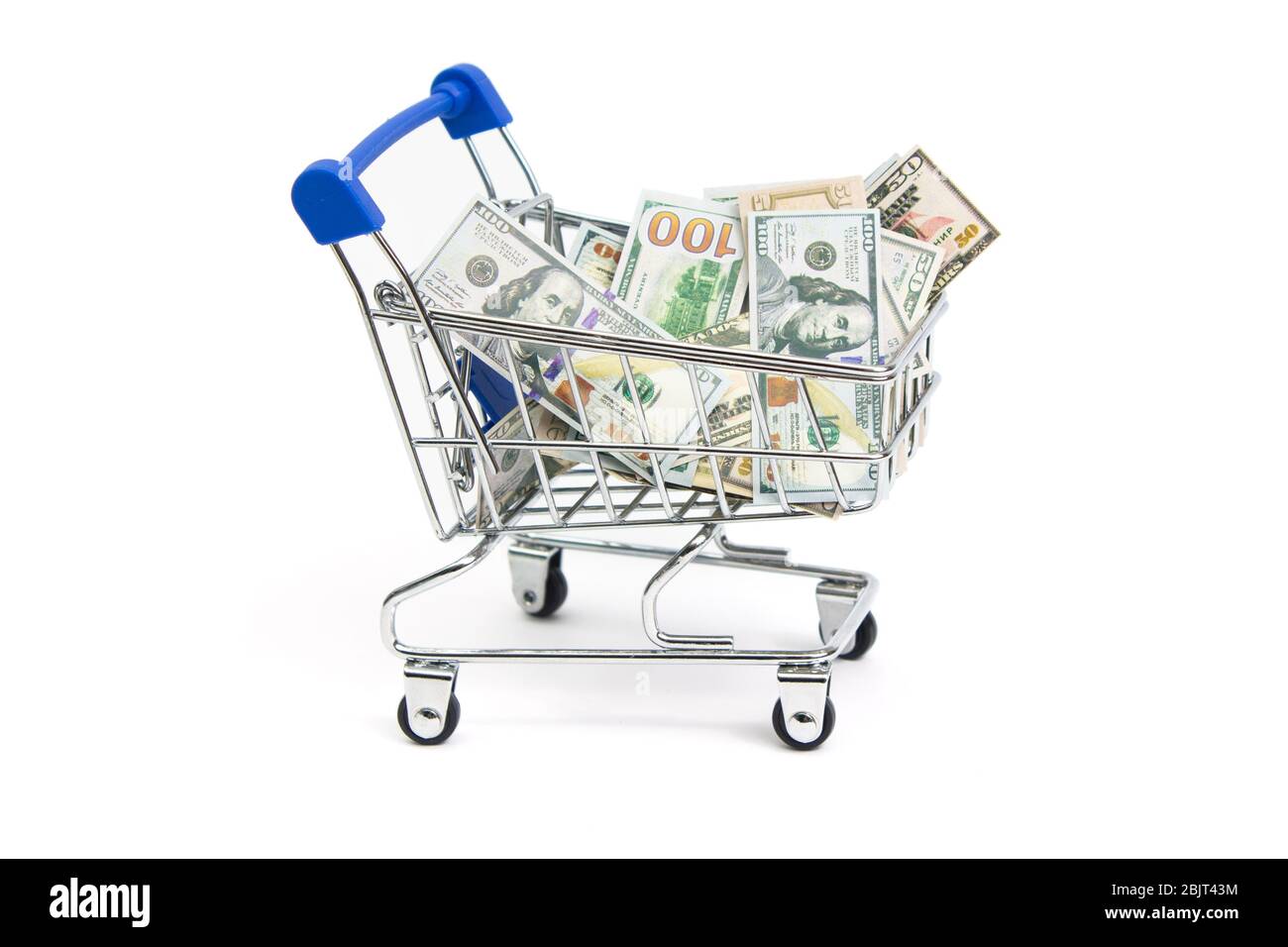 mini shopping cart mini money dollars on a white background isolate ...