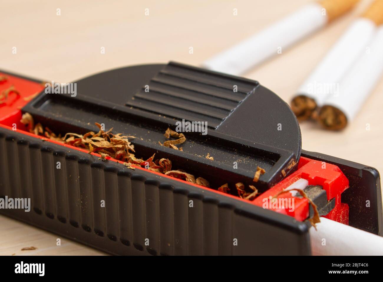 Tobacco filling machine hi-res stock photography and images - Alamy