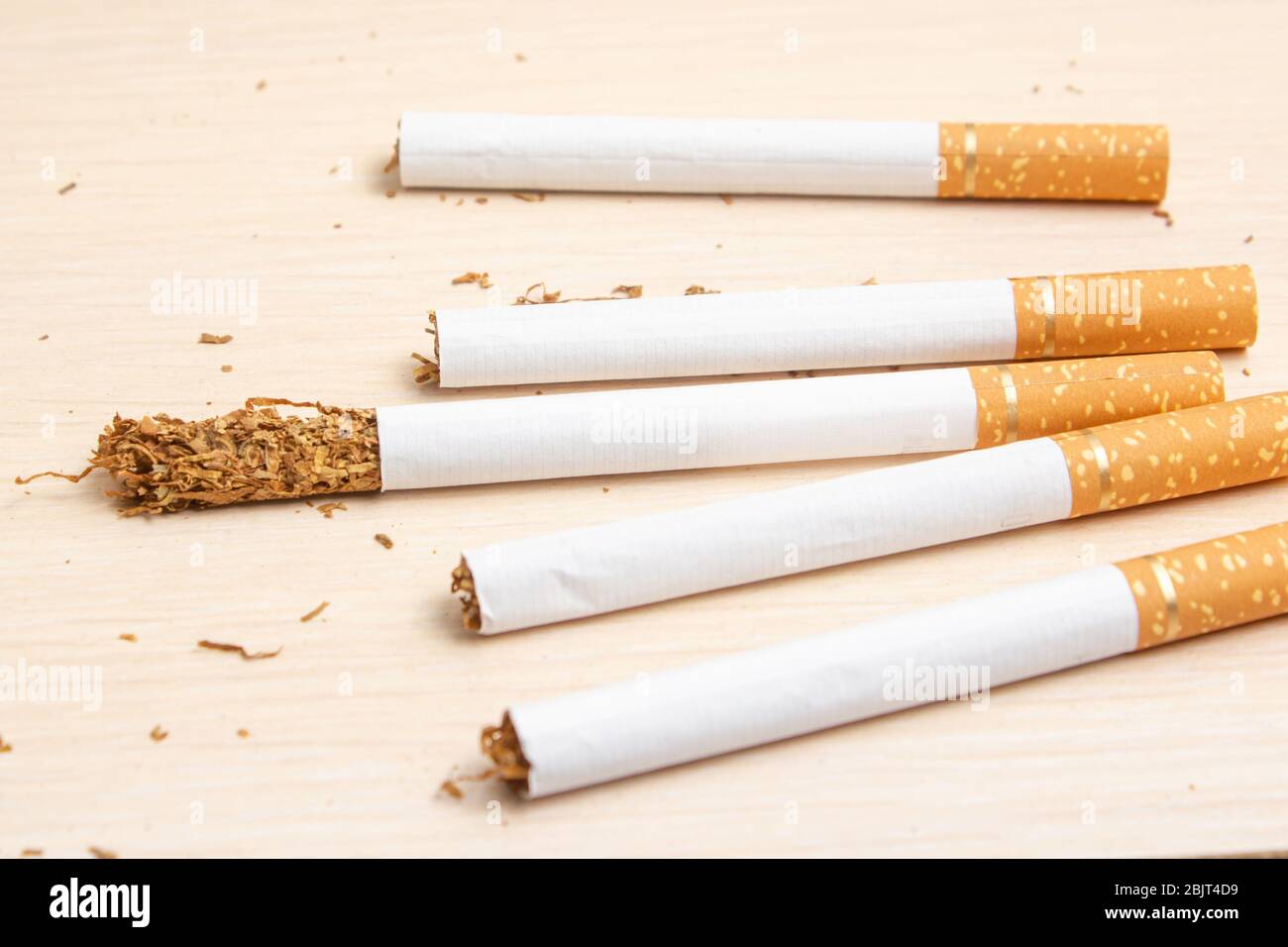 Five cigarettes hi-res stock photography and images - Alamy