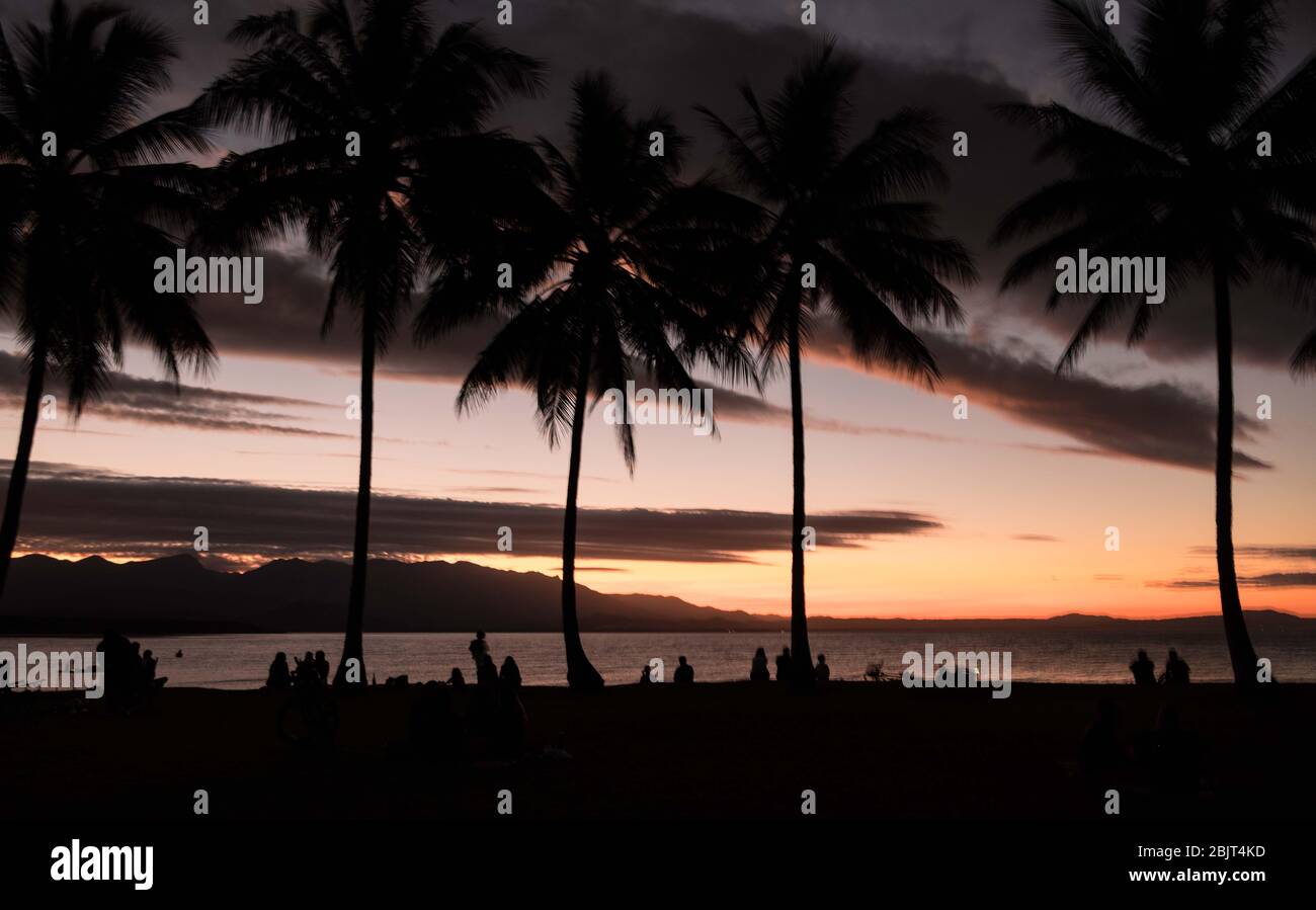 Sunset at Port Douglas park Stock Photo - Alamy