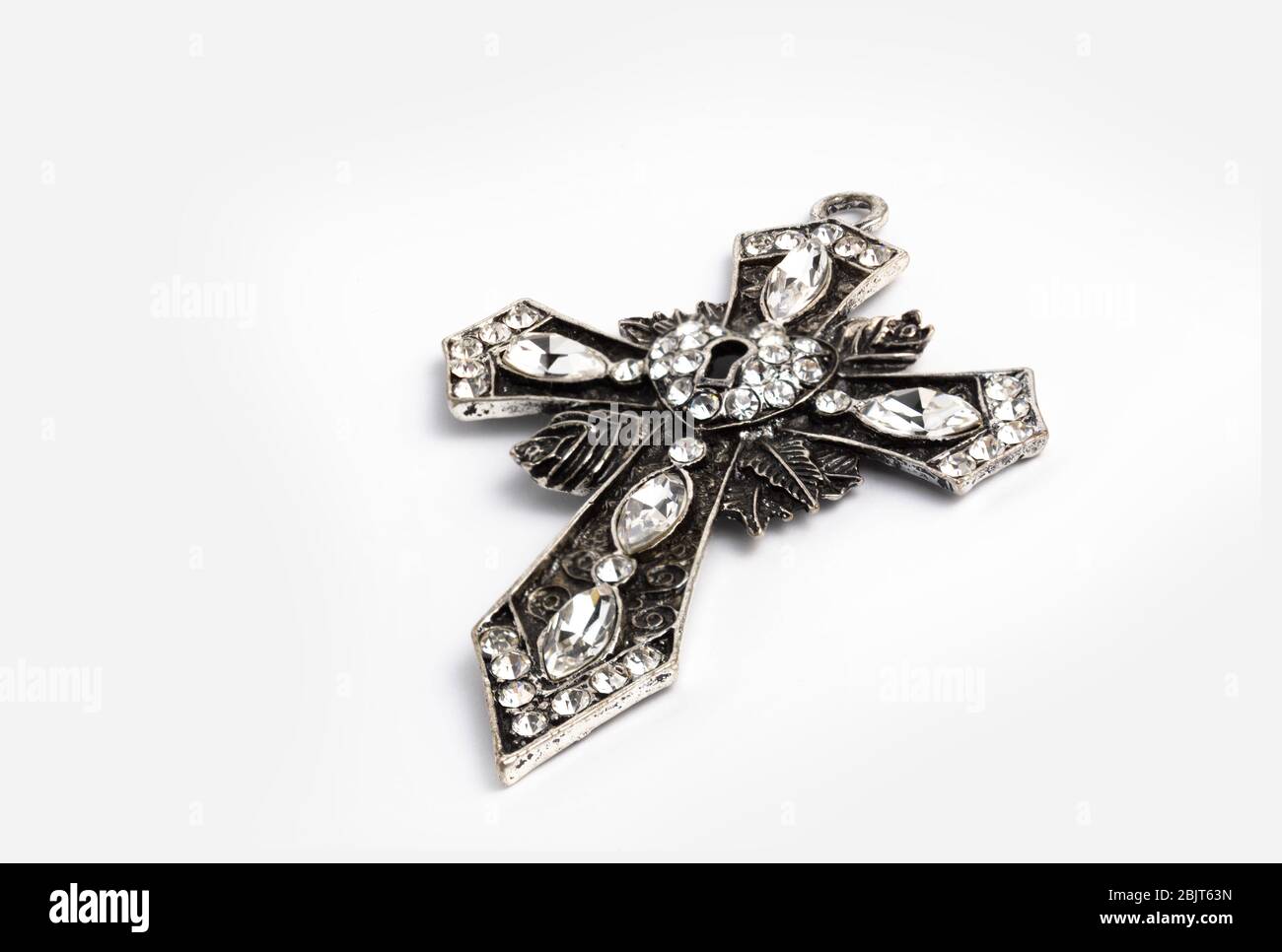 Big cross with rhinestones on a white background isolate Stock Photo ...