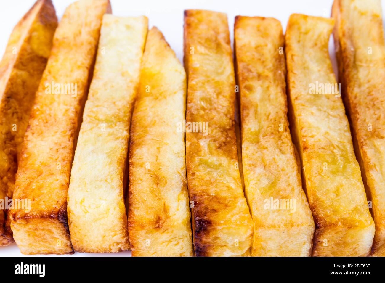 French fries on a white background isolate Stock Photo - Alamy