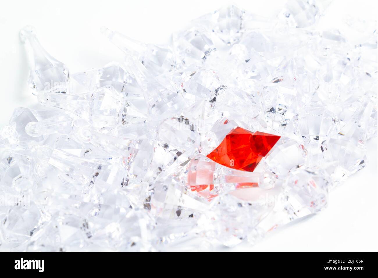 transparent crystals a single red on a white background isolate Stock ...