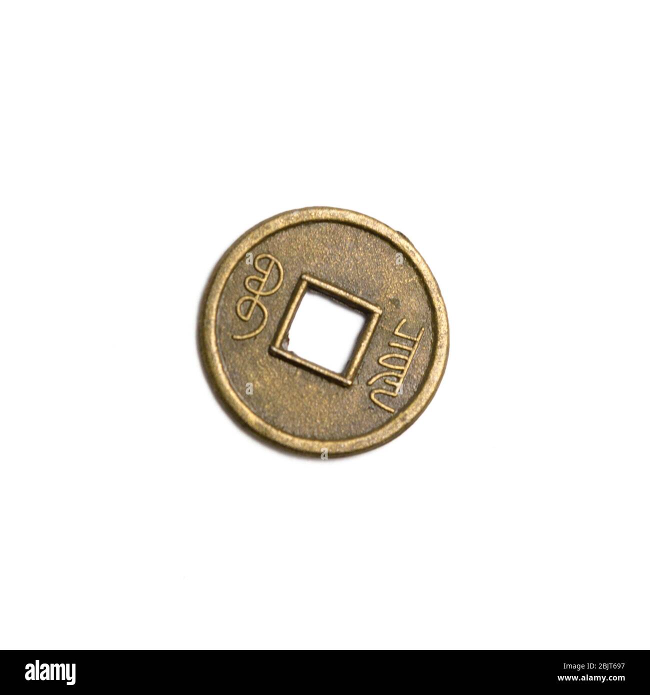 Chinese coin on a white background isolate Stock Photo - Alamy