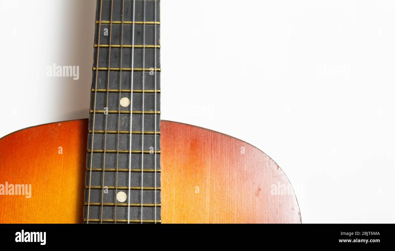 Acoustic guitar on a white background Stock Photo - Alamy