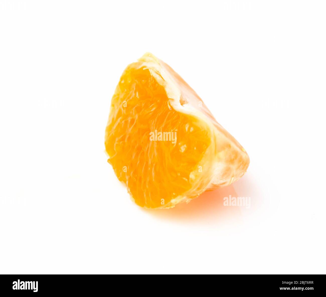 Orange mandarin one slice on a white background Stock Photo - Alamy