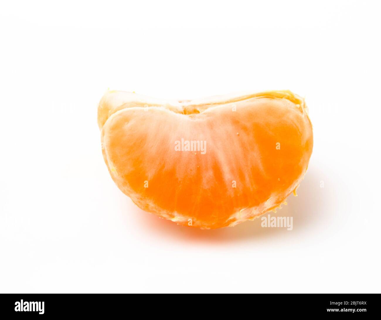 Orange mandarin one slice on a white background Stock Photo - Alamy