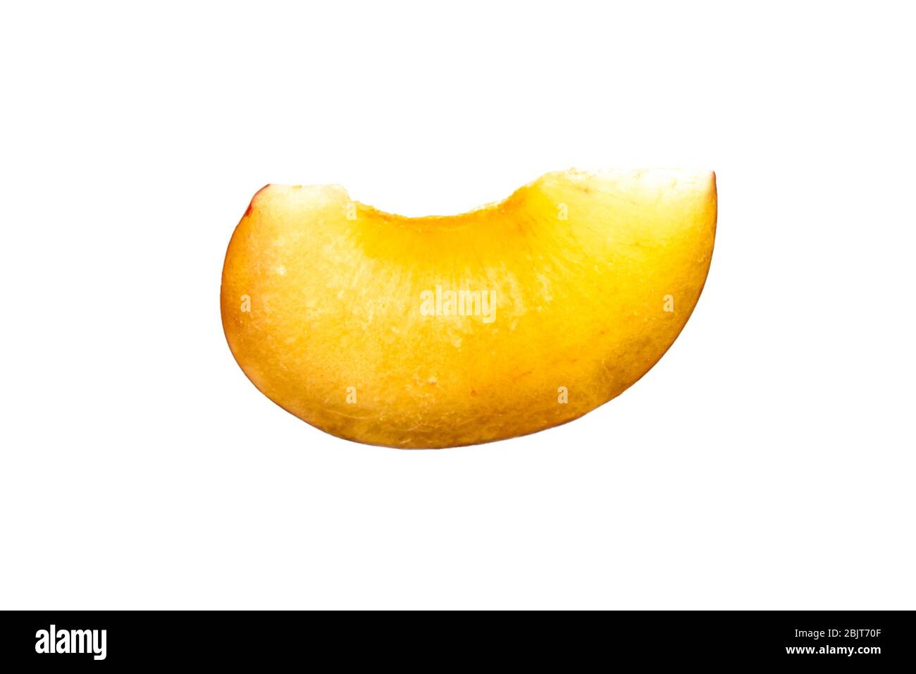 Ripe red plum in a cut on a white background. close up Stock Photo - Alamy