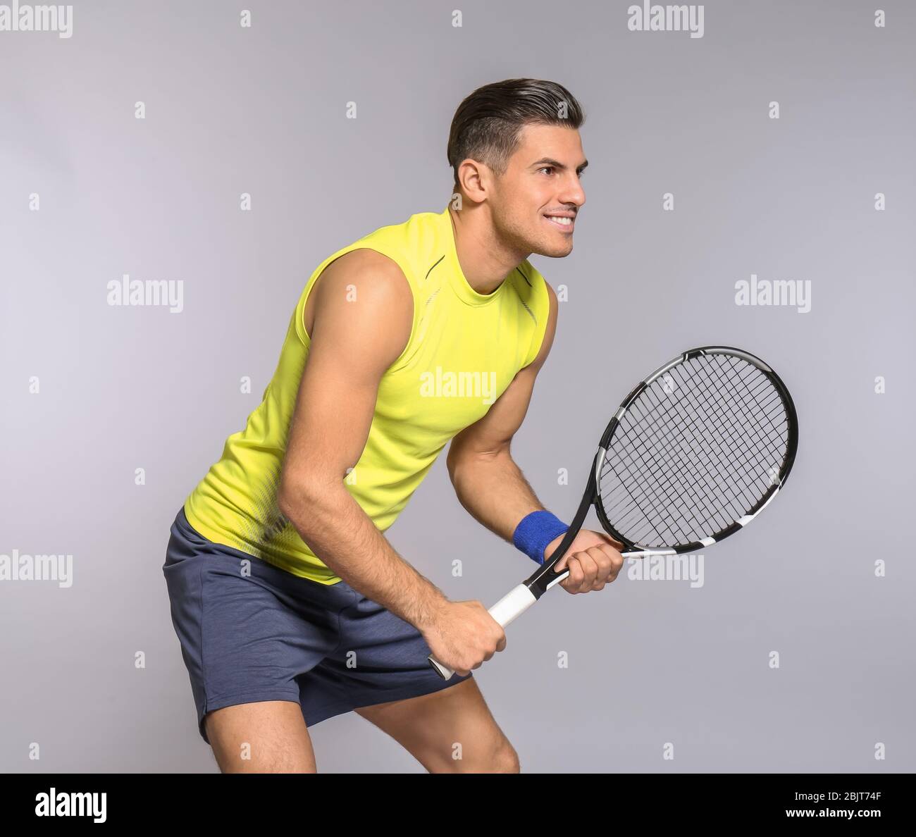 Man handsome smile tennis player hi-res stock photography and images ...
