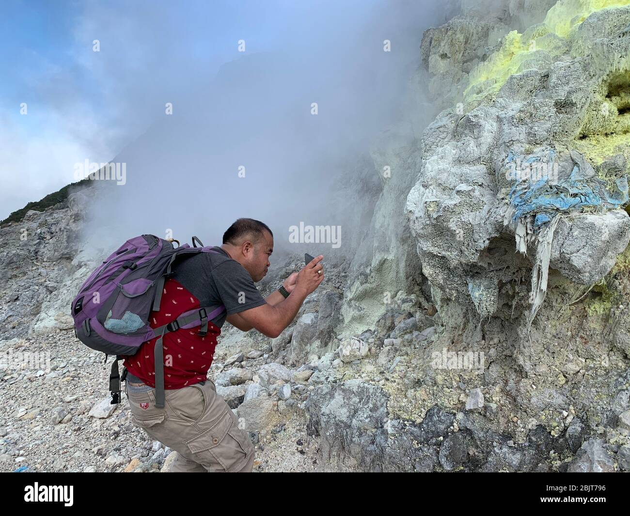 A volcanologist Takes Photo of Sibayak Volcano in Sumatra Island ...