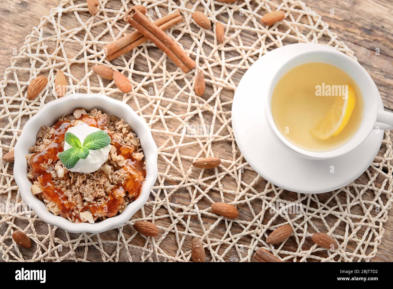 Ramekin with apple crisp and ice cream on table, top view Stock Photo ...