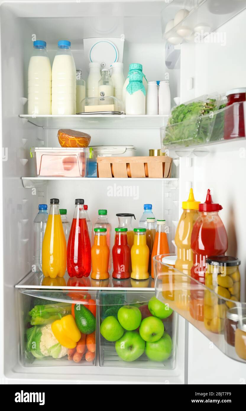 Many different fresh products in modern refrigerator Stock Photo - Alamy