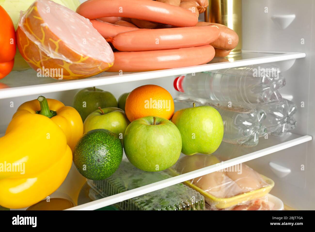 Many different fresh products in modern refrigerator Stock Photo - Alamy
