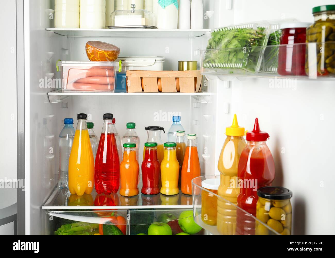 Many different fresh products in modern refrigerator Stock Photo - Alamy