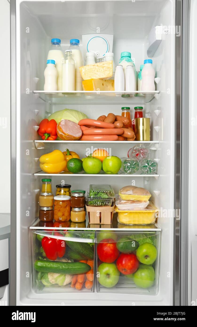 Many different fresh products in modern refrigerator Stock Photo - Alamy