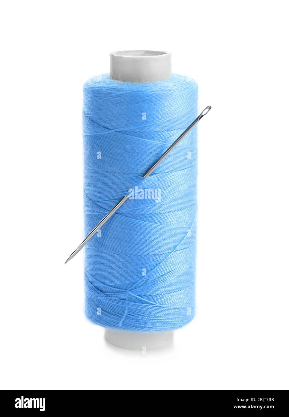 Blue thread and needle on white background Stock Photo - Alamy