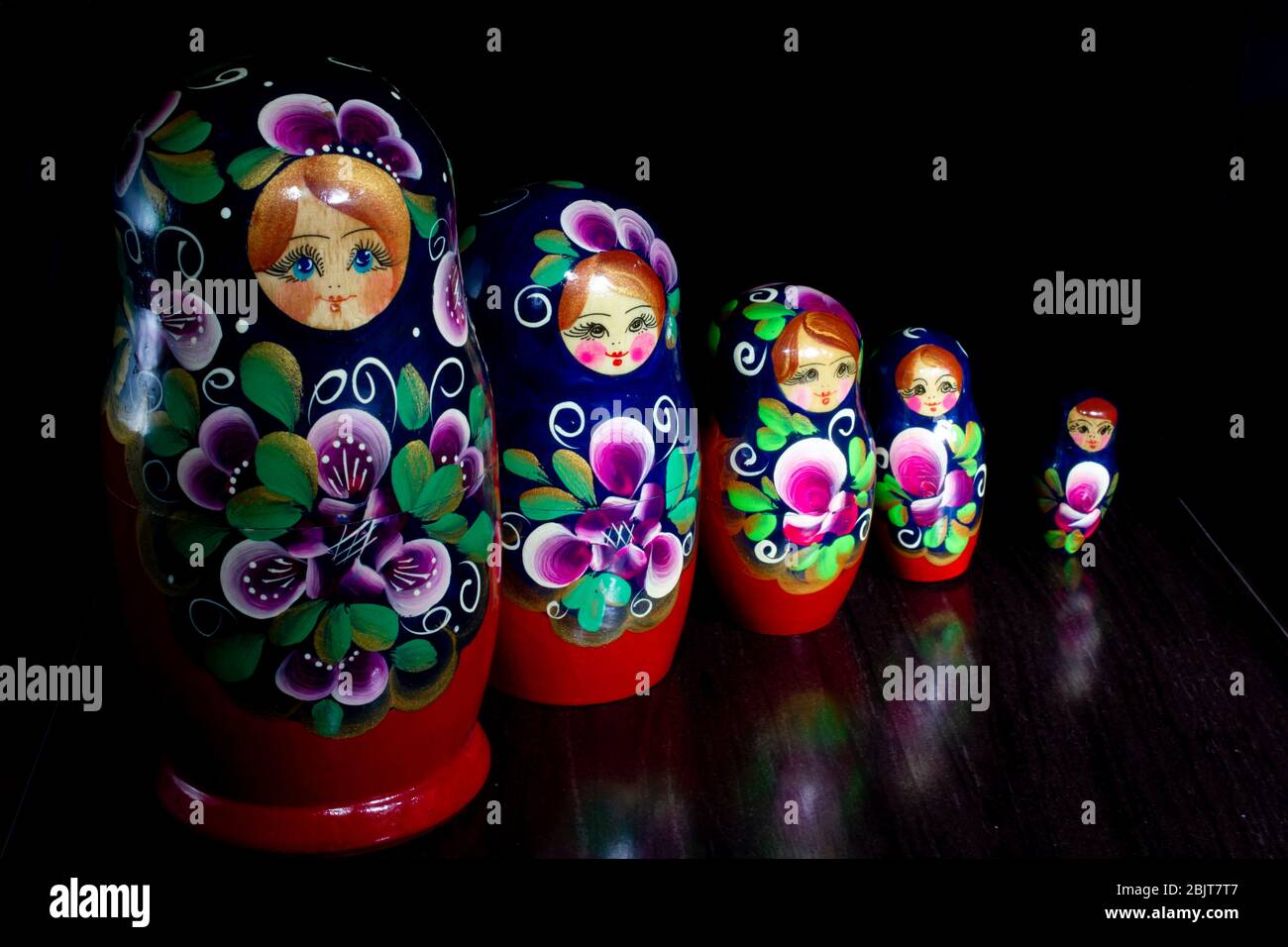 painted nesting doll on a dark background Stock Photo - Alamy