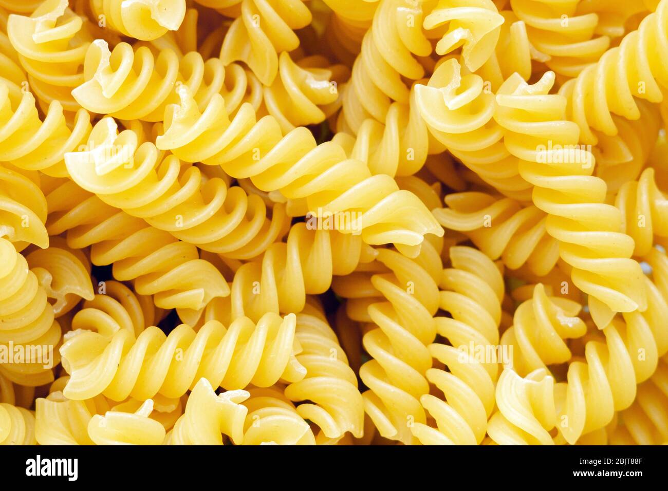 Pasta texture background. Pasta is a staple food of traditional Italian ...