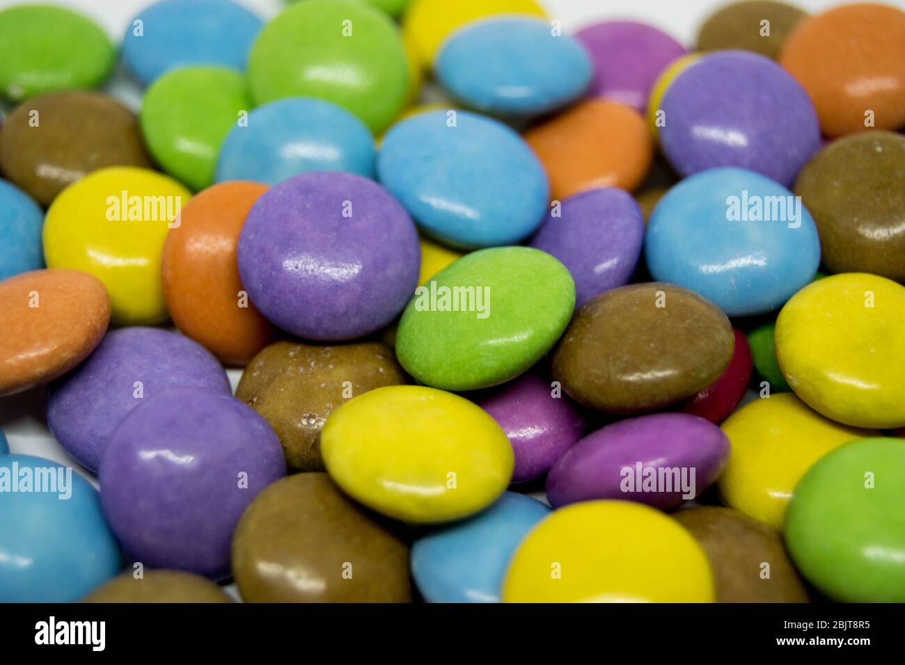 New blue smartie hi-res stock photography and images - Alamy