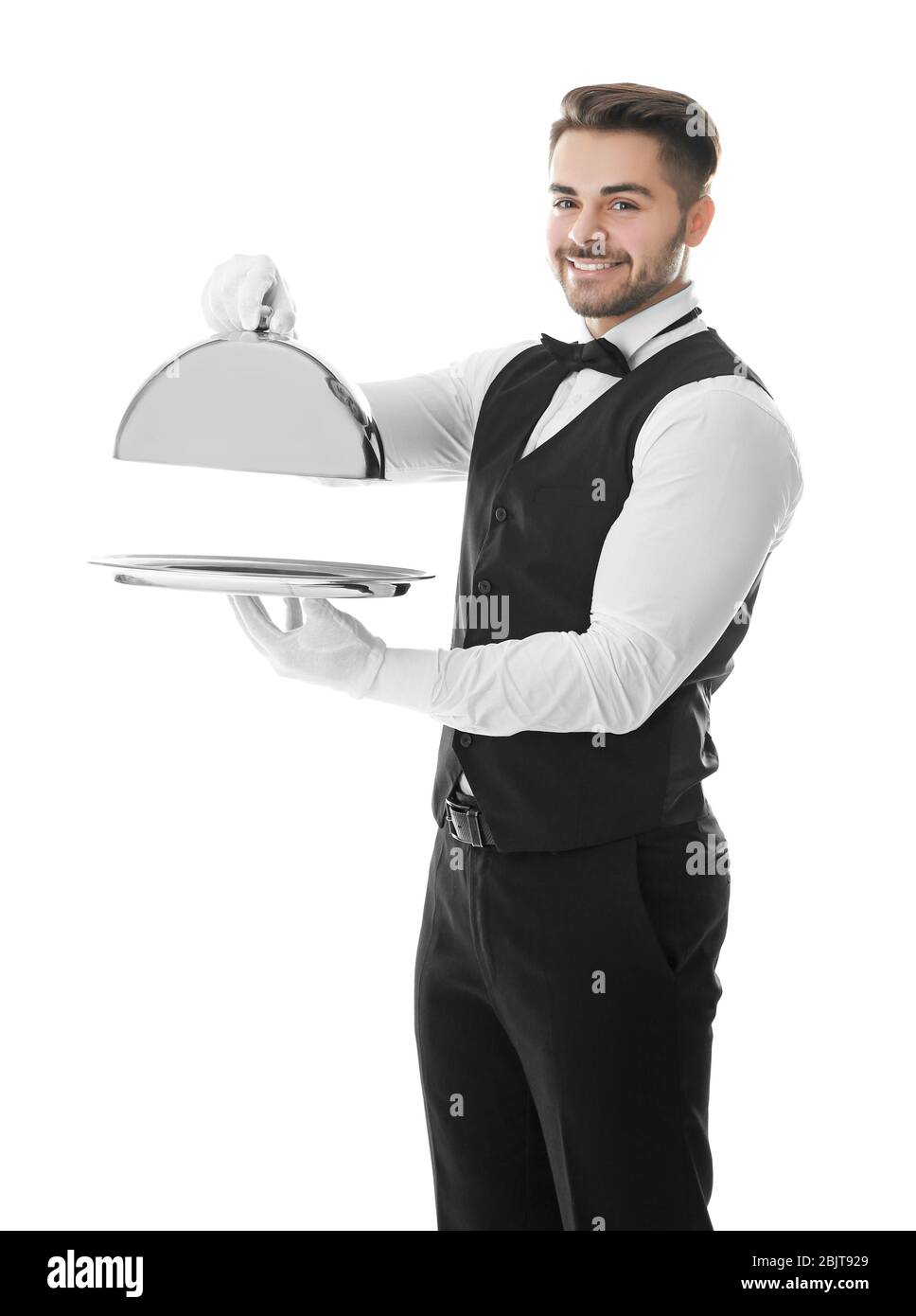 Waiter with metal tray and cloche on white background Stock Photo - Alamy