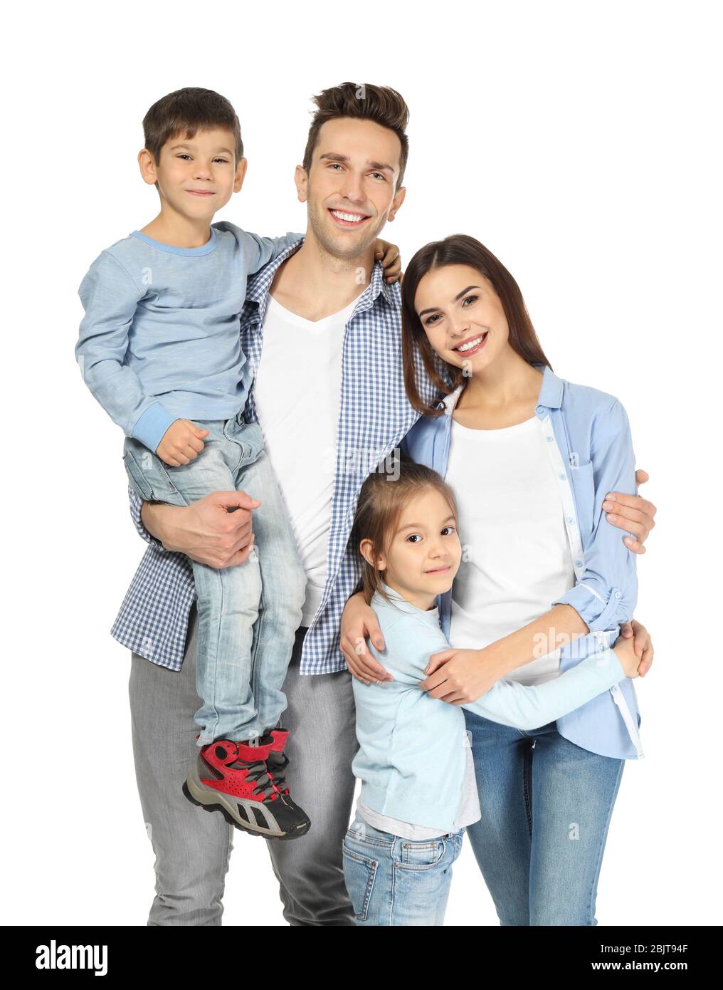 Happy family with little children on white background Stock Photo - Alamy