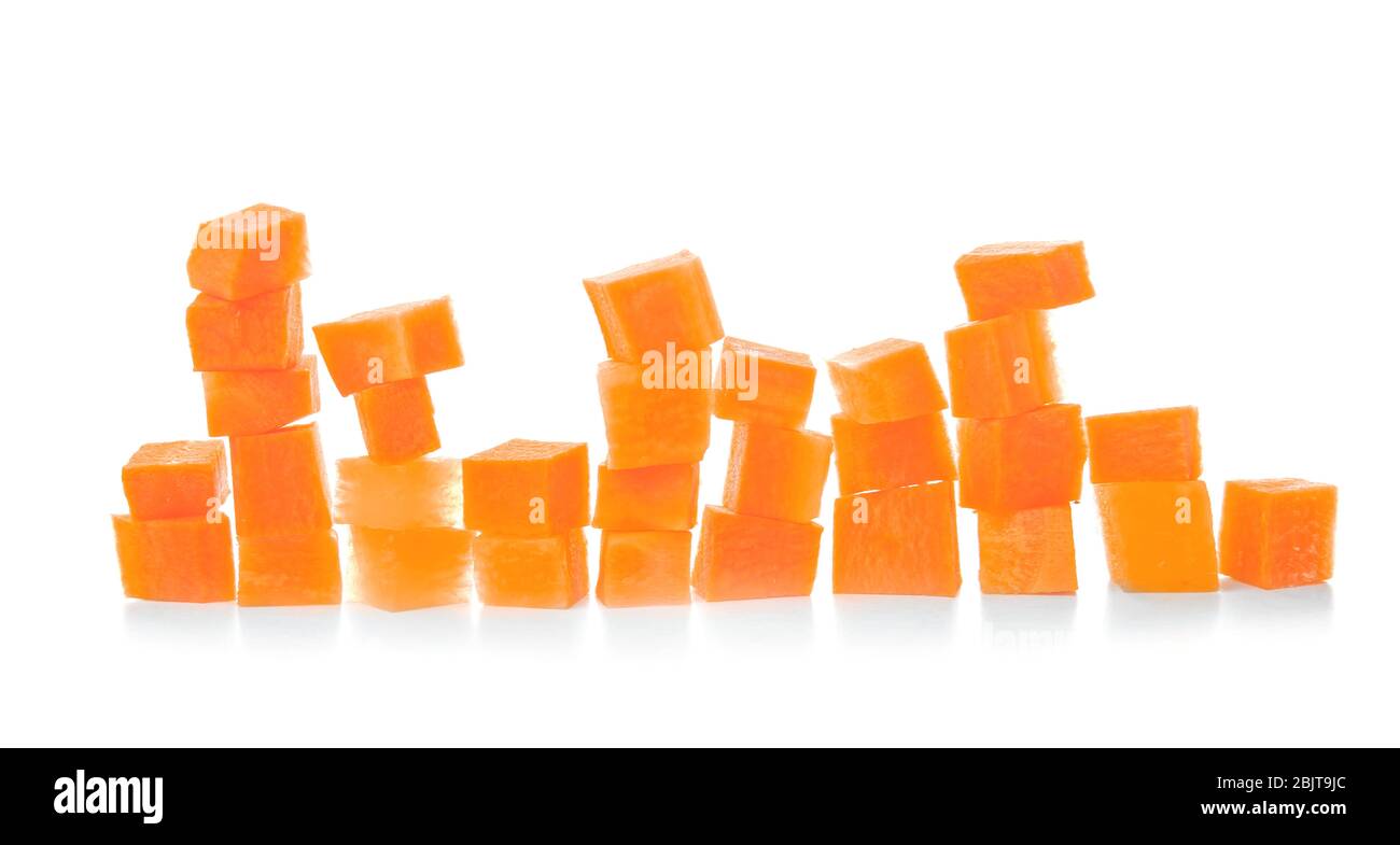 Stacked carrot slices on white background Stock Photo - Alamy