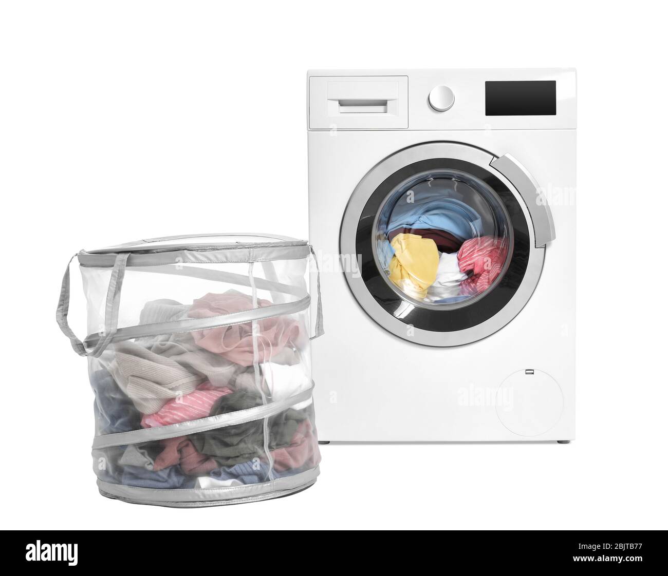 Washing machine and basket with laundry on white background Stock Photo ...