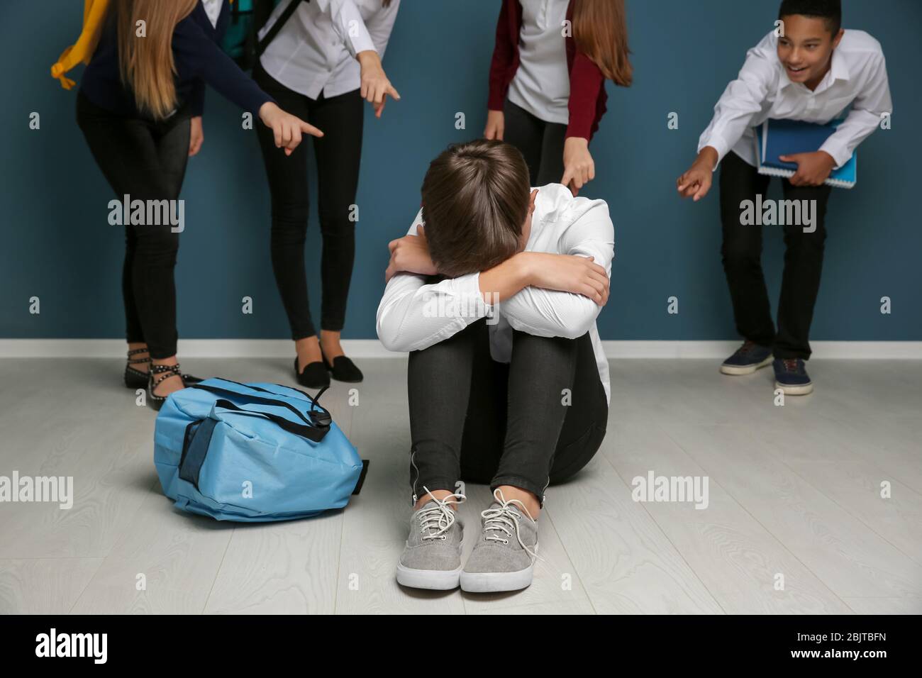 Bullying school teens hi-res stock photography and images - Alamy