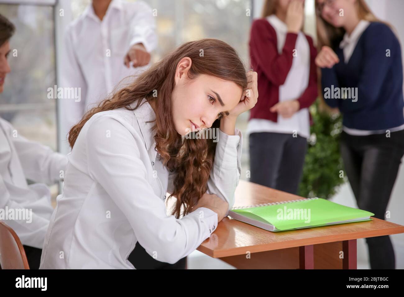 Teens bullying their classmate in school Stock Photo - Alamy