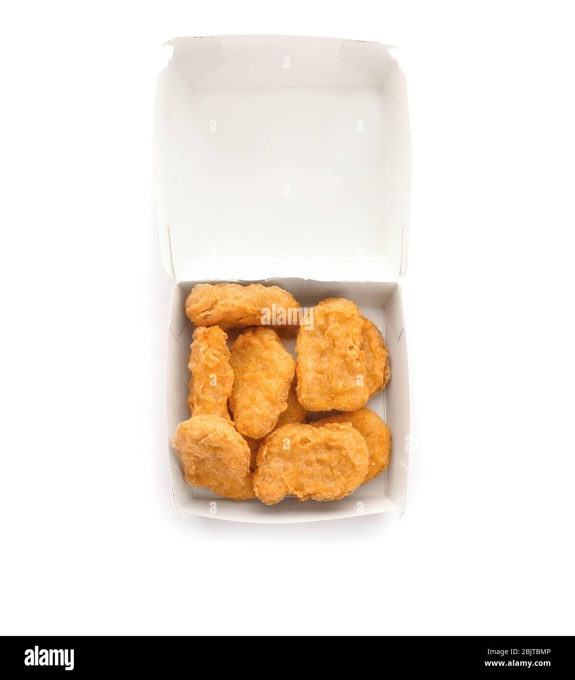 Box with tasty chicken nuggets on white background Stock Photo - Alamy