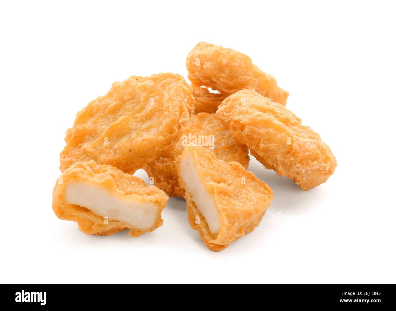 Tasty chicken nuggets on white background Stock Photo - Alamy