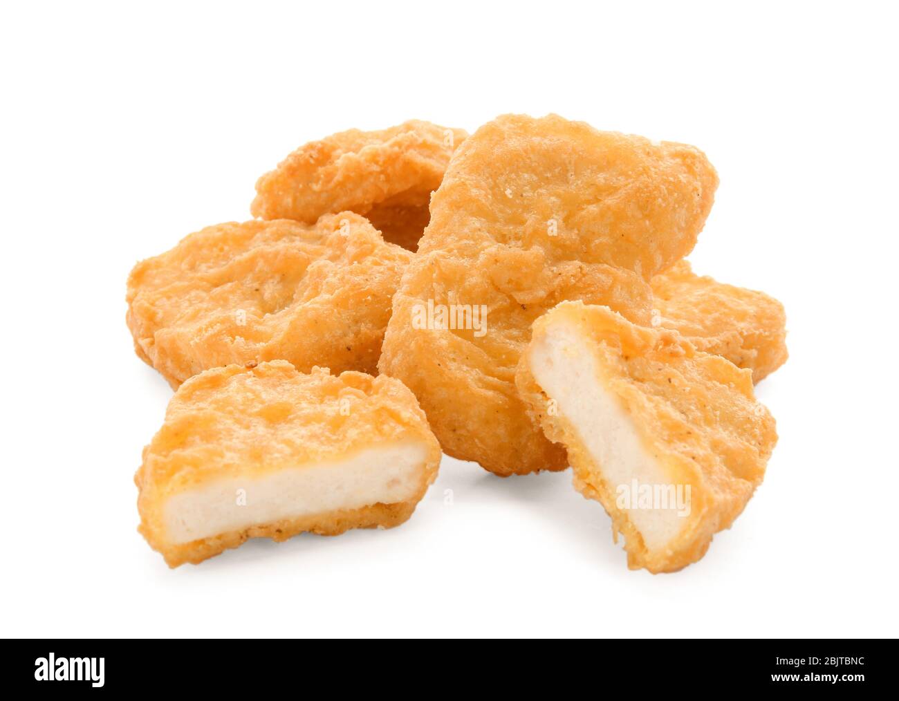 Tasty chicken nuggets on white background Stock Photo - Alamy
