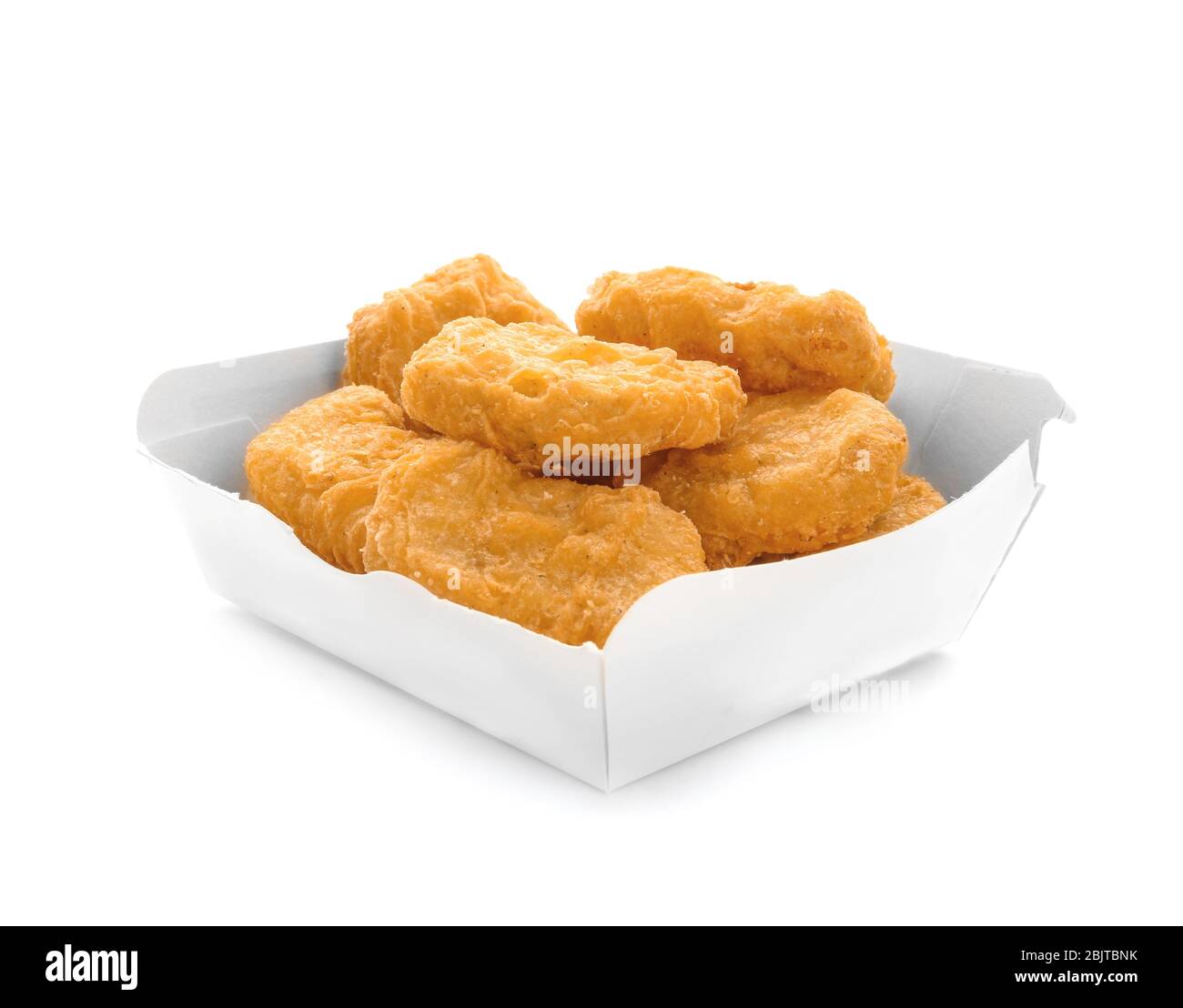 Box with tasty chicken nuggets on white background Stock Photo - Alamy