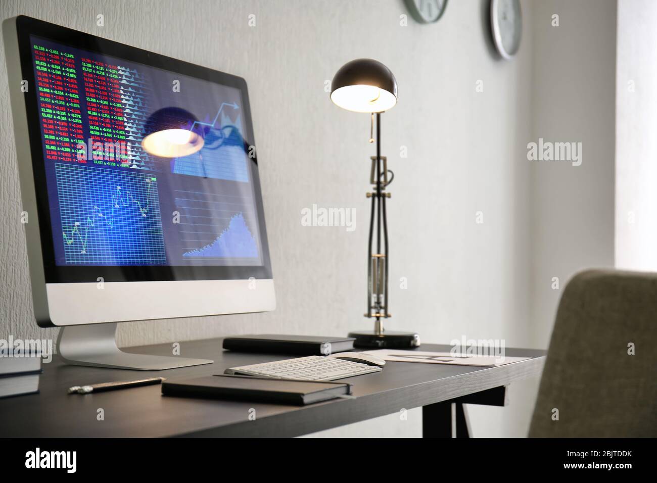 Modern comfortable workplace with computer on desk at home Stock Photo ...