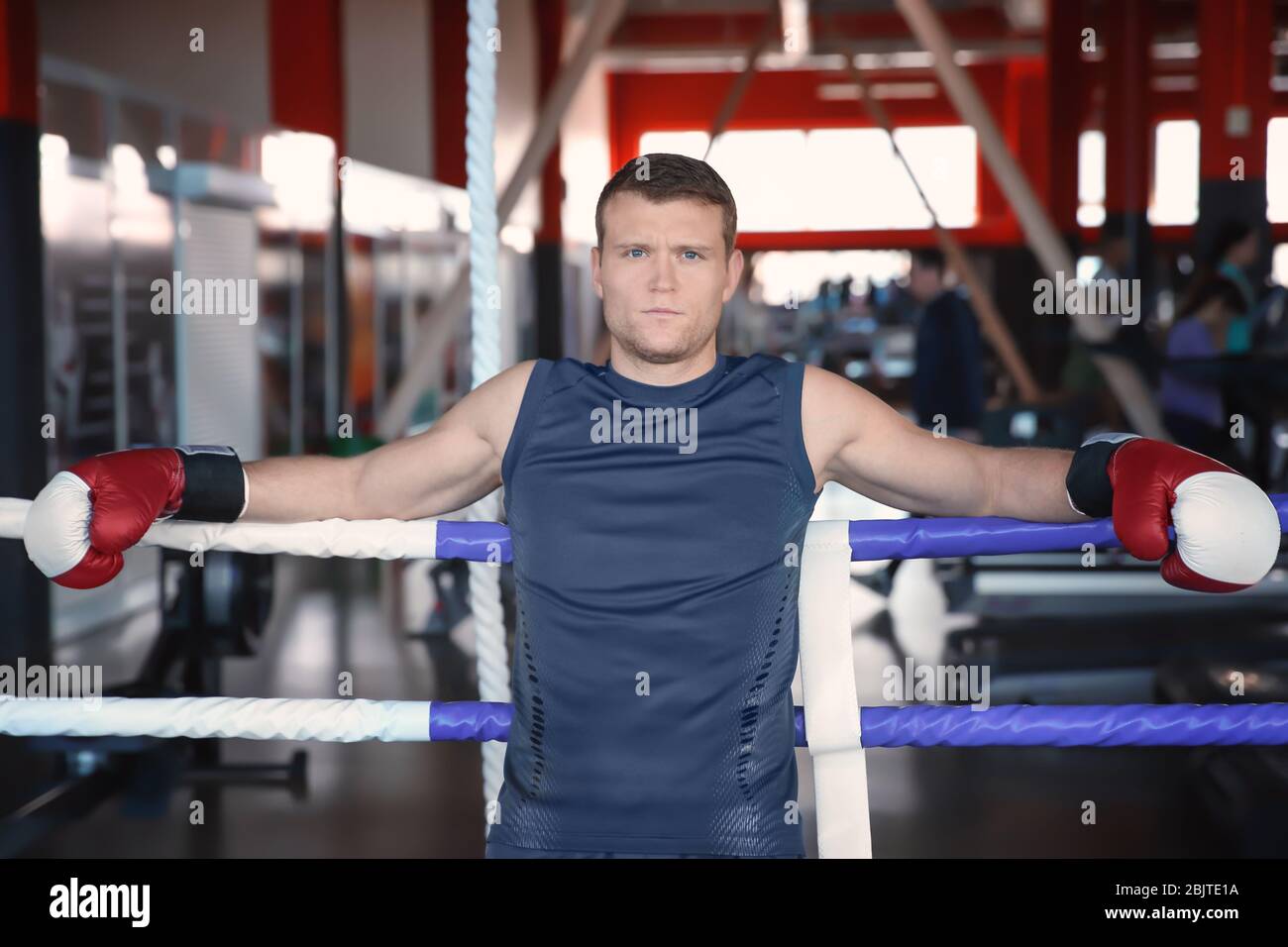 Young man in boxing ring Stock Photo - Alamy