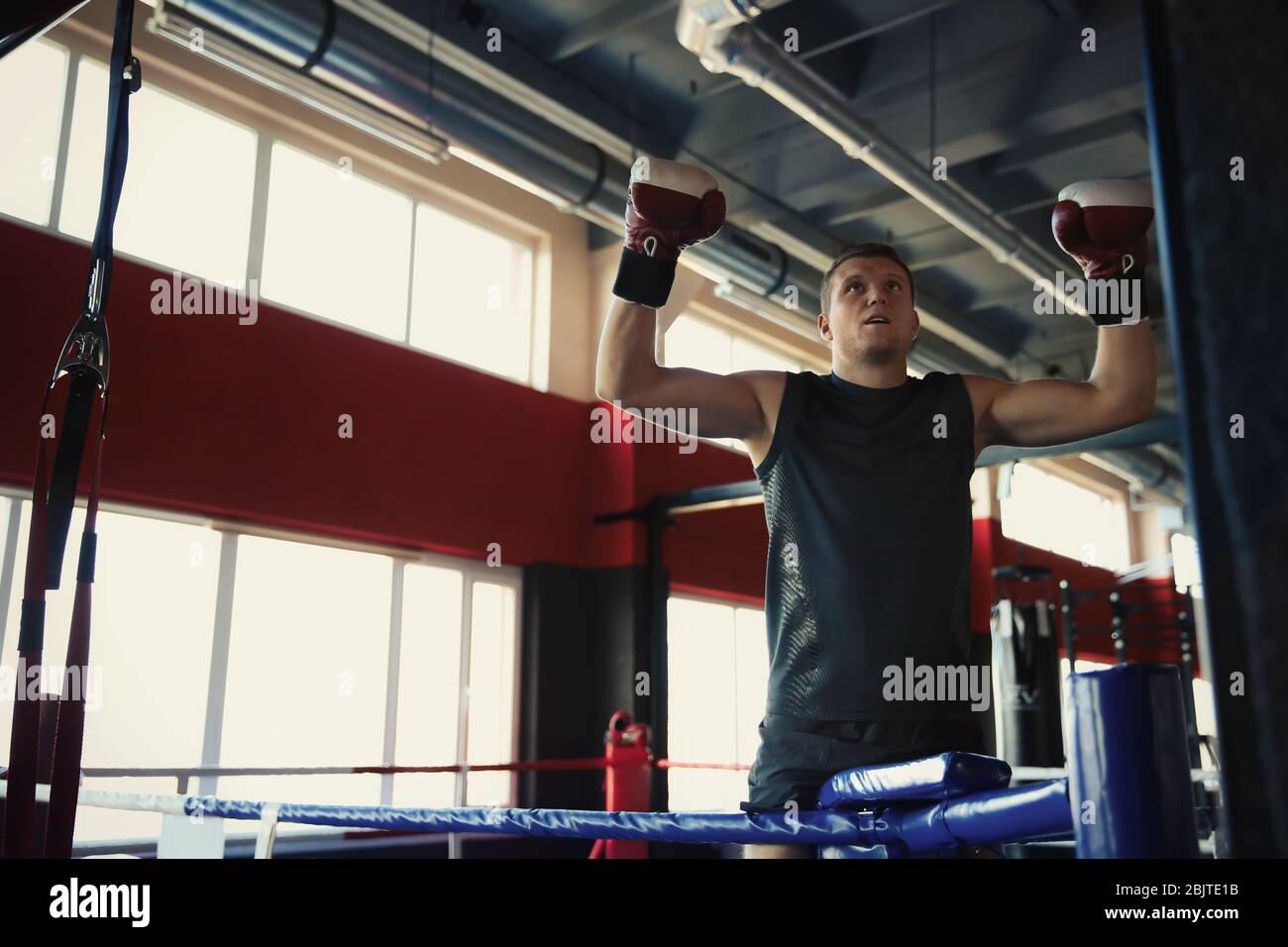 Young man in boxing ring Stock Photo - Alamy