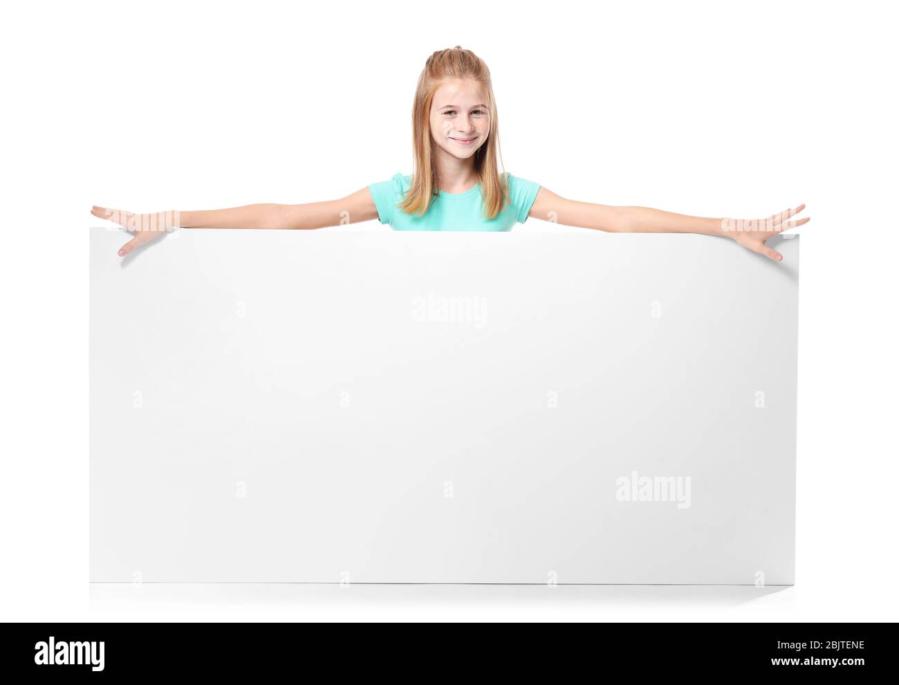 Cute girl with blank advertising board on white background Stock Photo ...