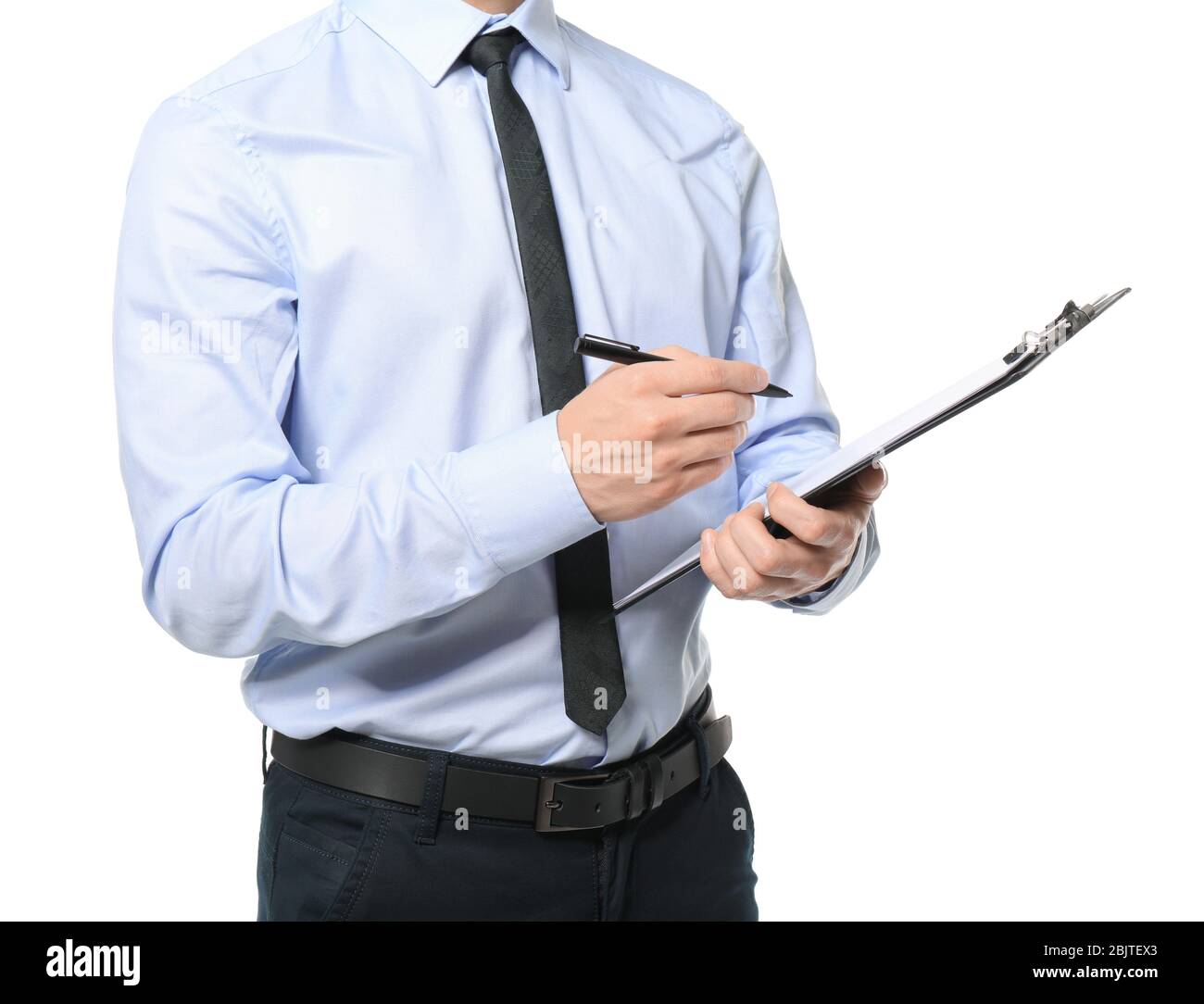 Car salesman writing on clipboard against white background Stock Photo ...