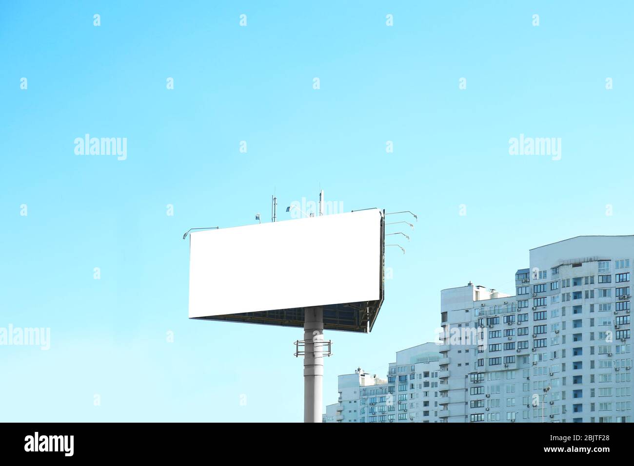 Blank advertising board on city street Stock Photo - Alamy